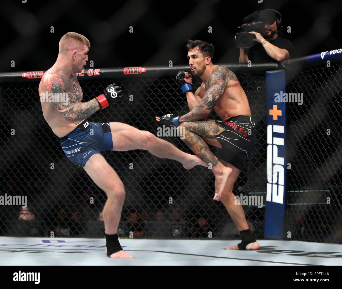 Chris Duncan (left) in action against Omar Morales in their lightweight ...