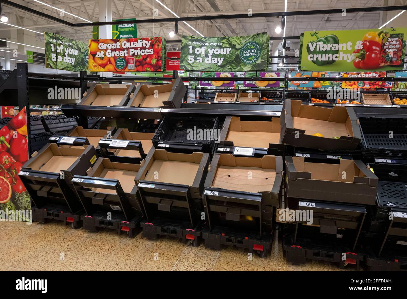 Empty supermarket shelves in an ASDA store. Supplies of tomatoes and ... Empty supermarket shelves in an ASDA store. Supplies of tomatoes and ...