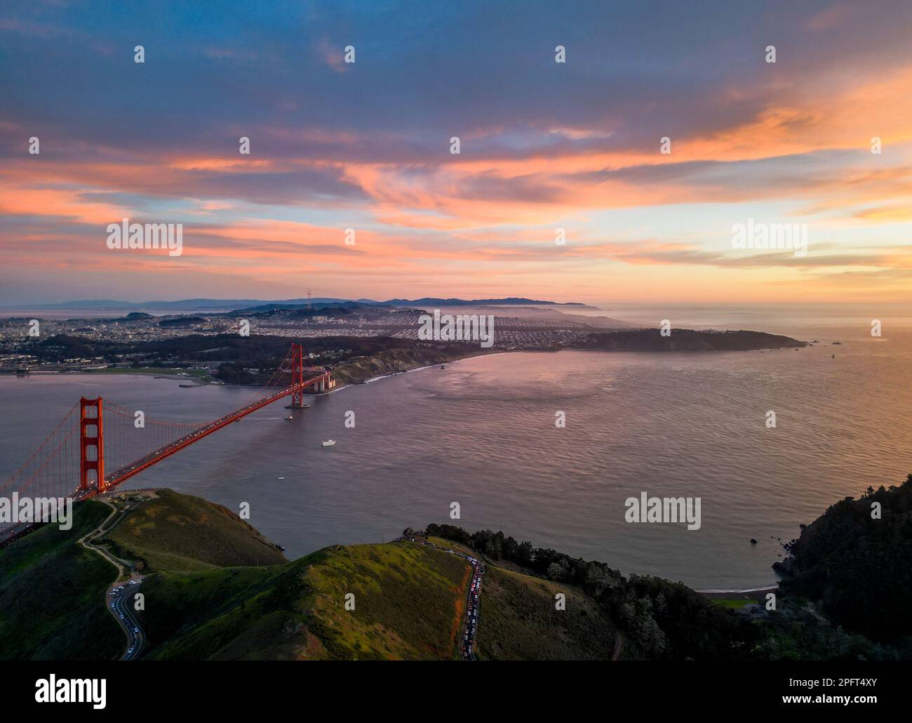 Beautiful sunset sky over Golden Gate Bridge and city of San Francisco ...