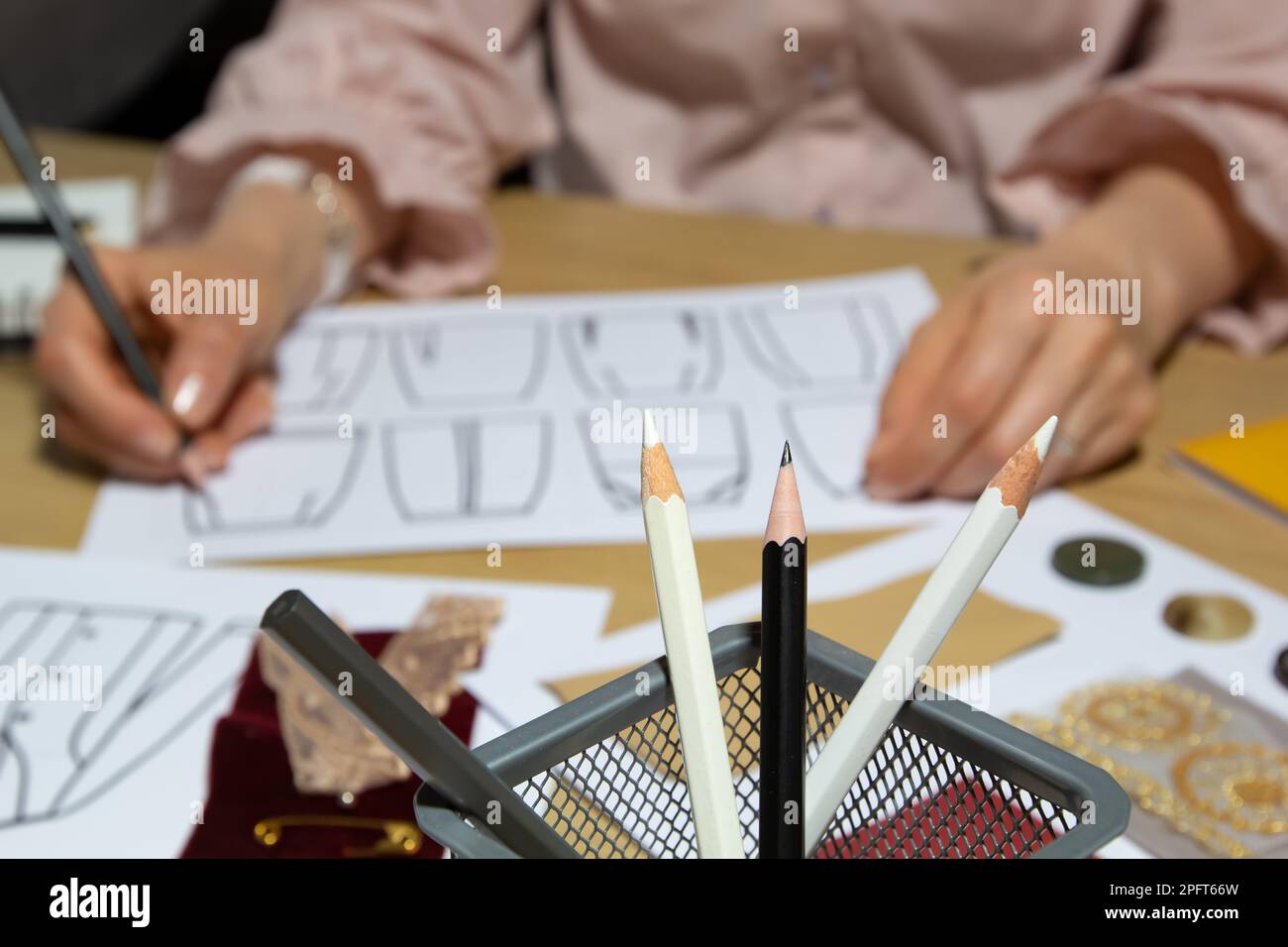 Woman draws pencil on paper hi-res stock photography and images - Alamy