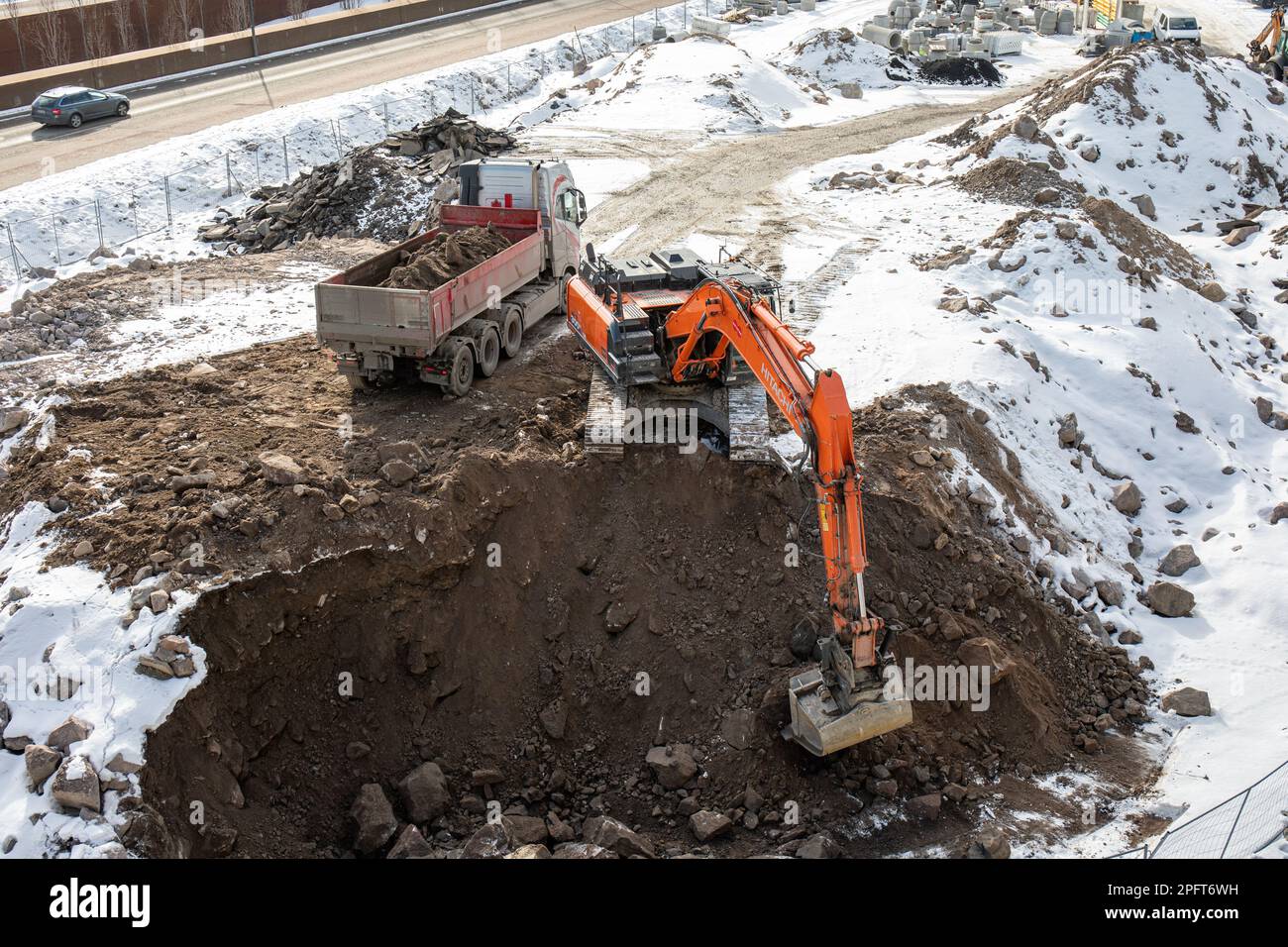 Hitachi ZX300LC tracked excavator doing earthwork construction in ...
