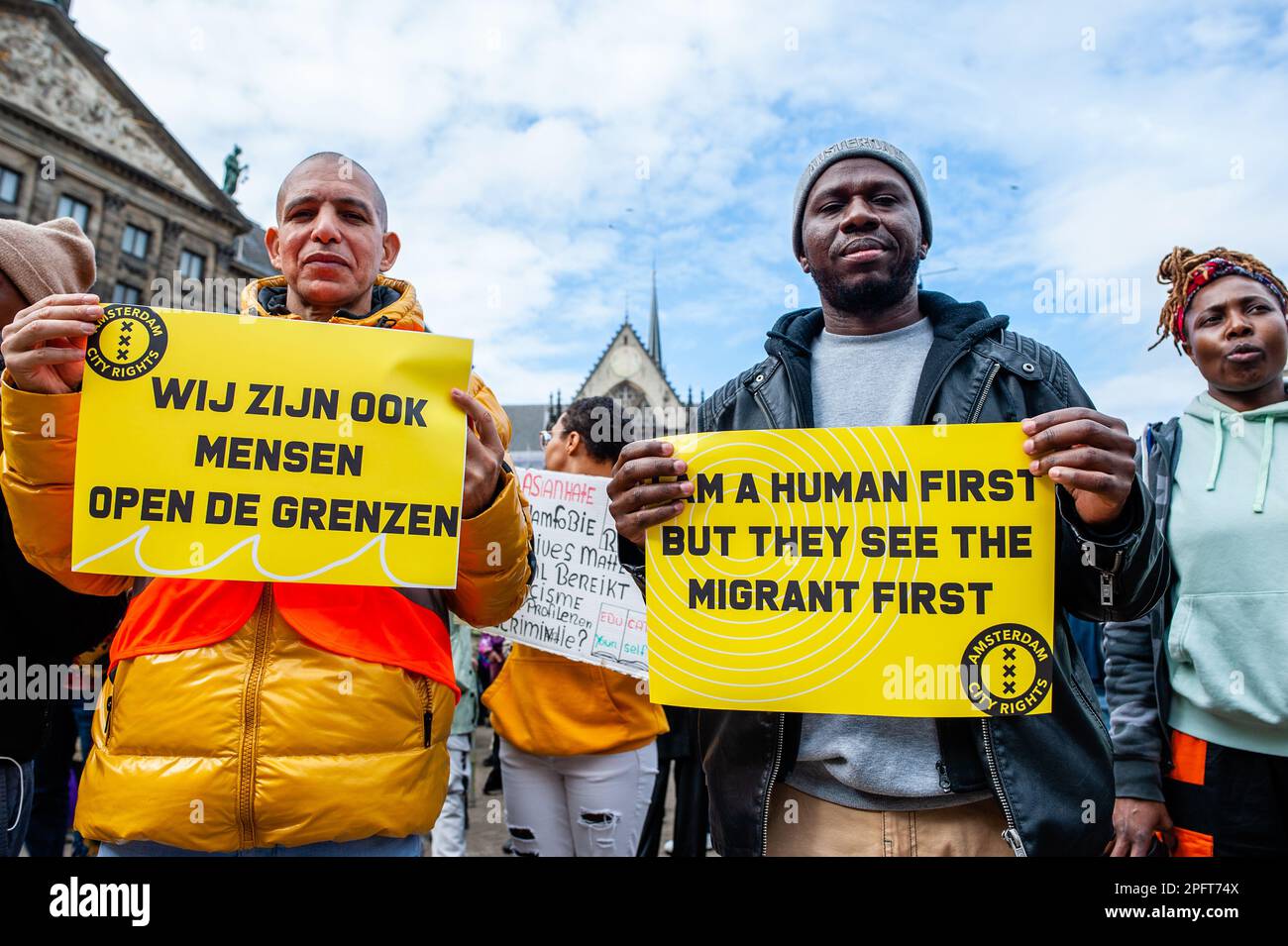 Amsterdam, Netherlands. 18th Mar, 2023. Two men are seen holding yellow ...
