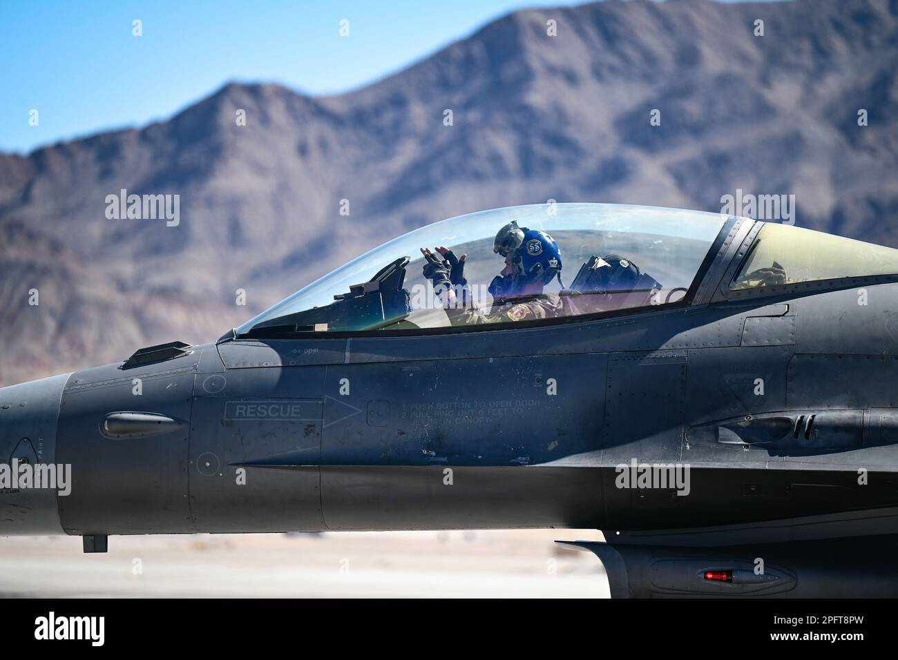 A U.S. Air Force pilot assigned to the 55th Fighter Squadron displays ...