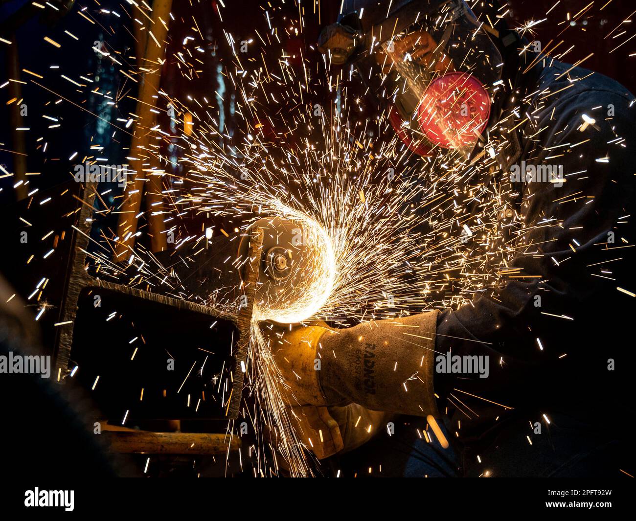 A Red Hill Bulk Fuel Storage Facility (RHBFSF) contractor trims a ...