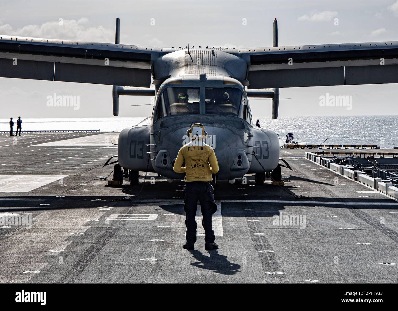 EAST CHINA SEA (March 16, 2023) - A U.S. Navy flight deck handler ...