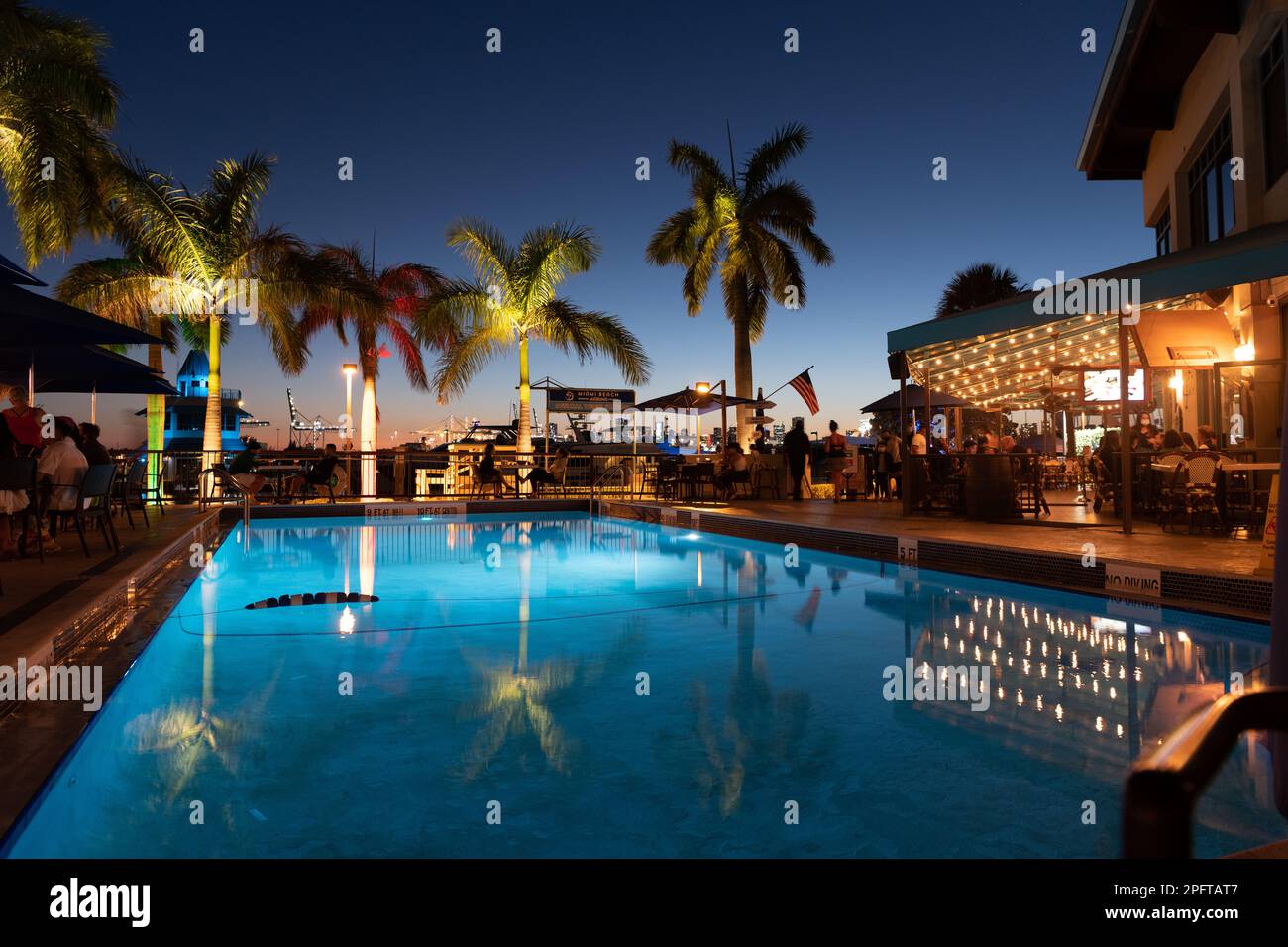 Miami, Florida USA - March 24, 2021: summer vacation at swimming pool ...