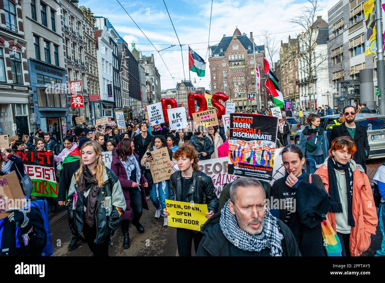 Amsterdam, Netherlands. 18th Mar, 2023. Hundreds of protesters are seen ...