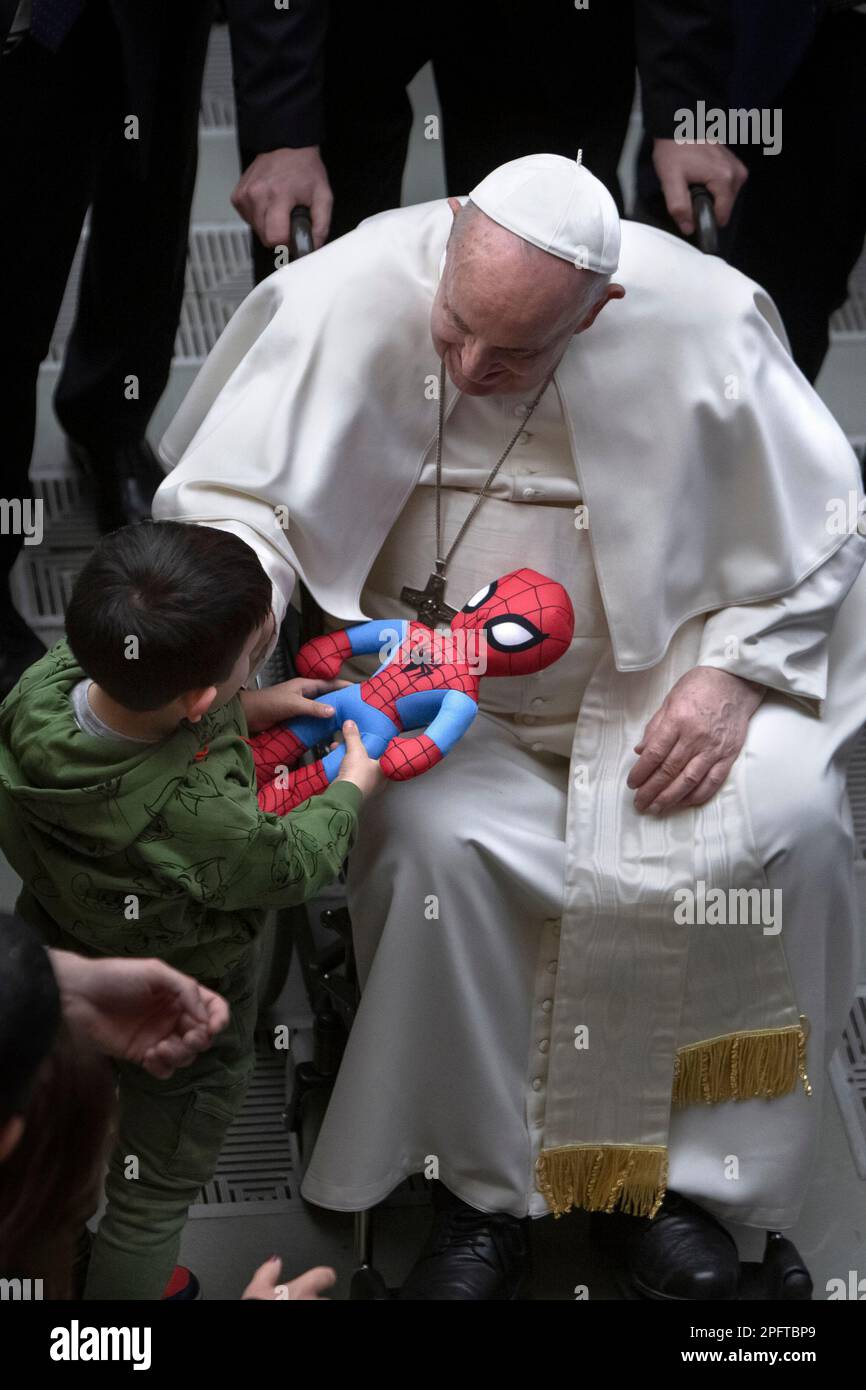 Vatican City, vatican, 18 March 2023. A child gives a spider-man toy to ...