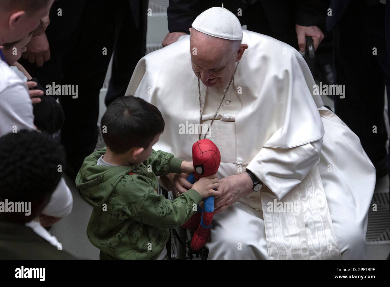 Vatican City, vatican, 18 March 2023. A child gives a spider-man toy to ...