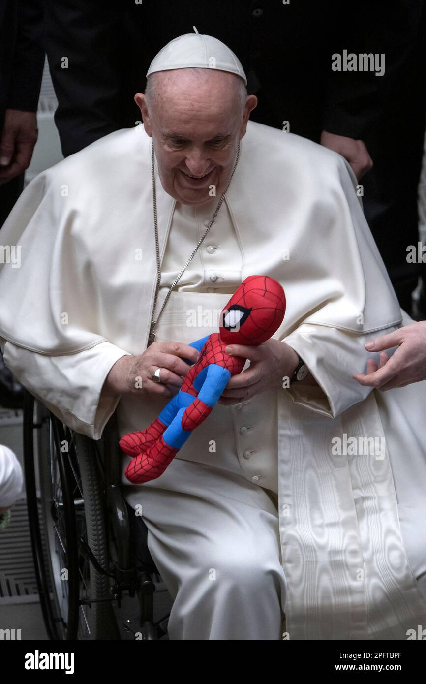Vatican City, vatican, 18 March 2023. A child gives a spider-man toy to ...