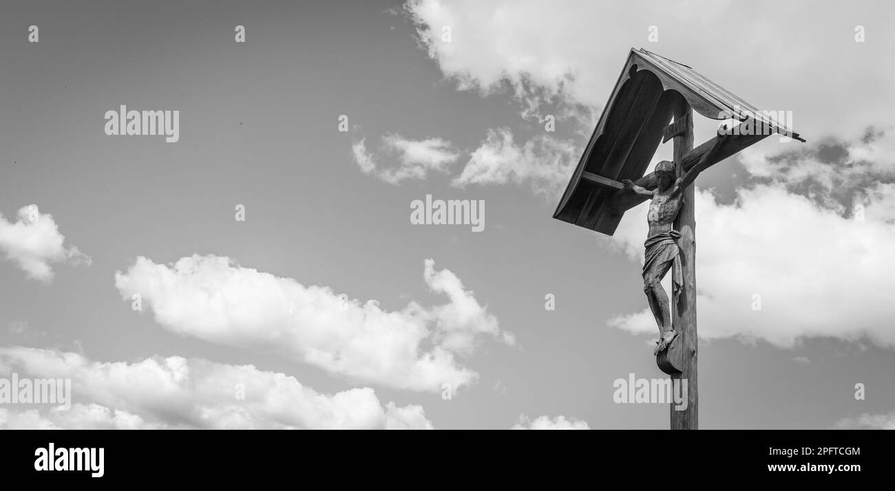 A 100 years old Crucifix, made of wood, tipical of Dolomity Region in ...
