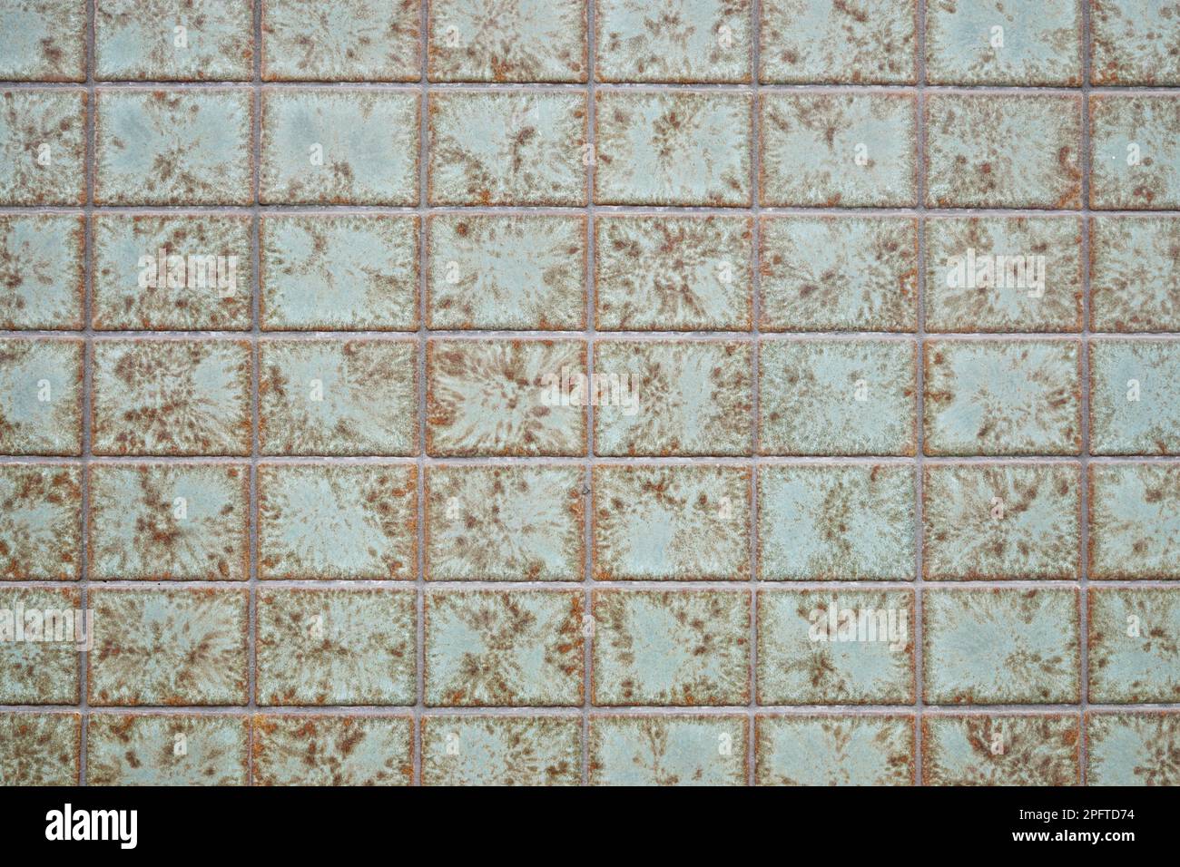 tiled exterior wall background with weathered green vintage tiling ...