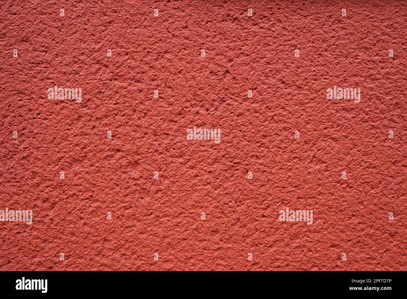 roughcast plaster wall background texture in red Stock Photo - Alamy