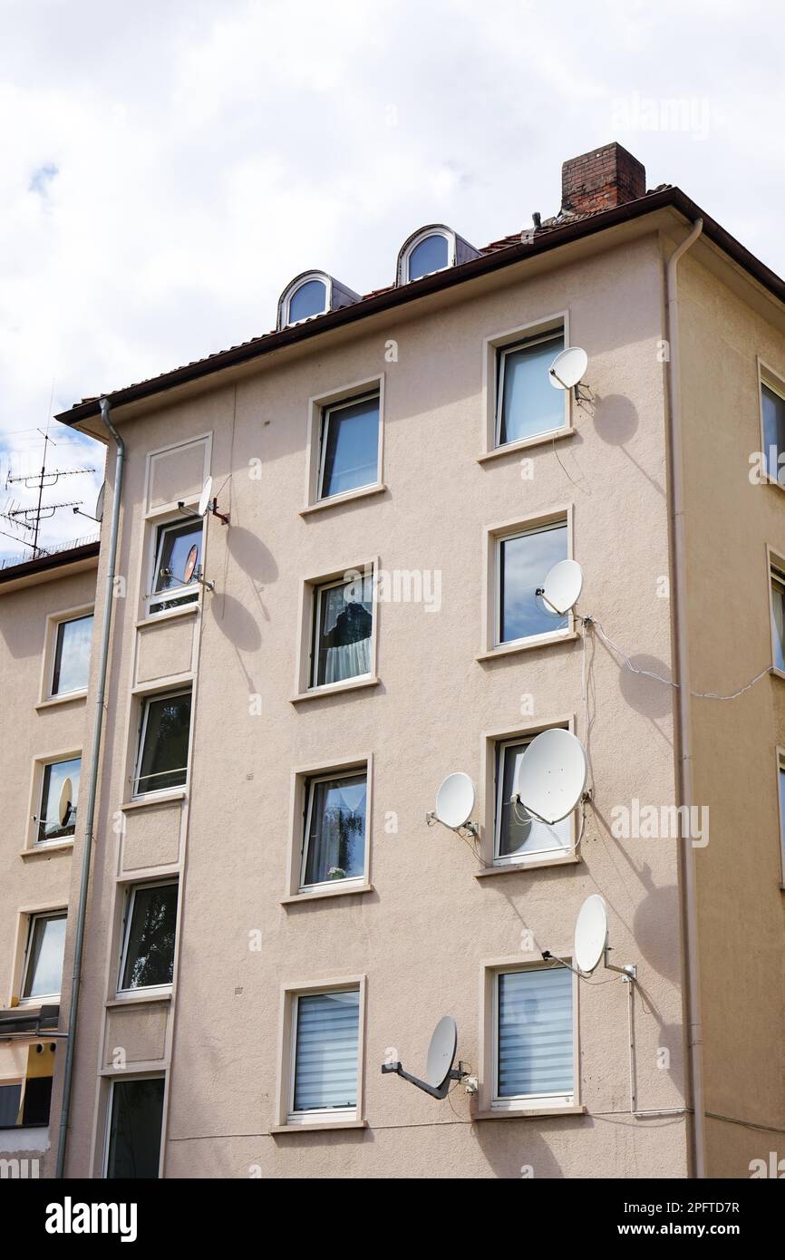 residential building with many satellite dishes Stock Photo - Alamy