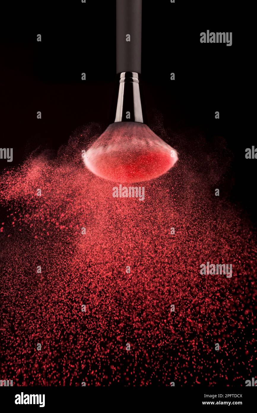 upside down makeup brush red powder splash. High resolution photo Stock ...