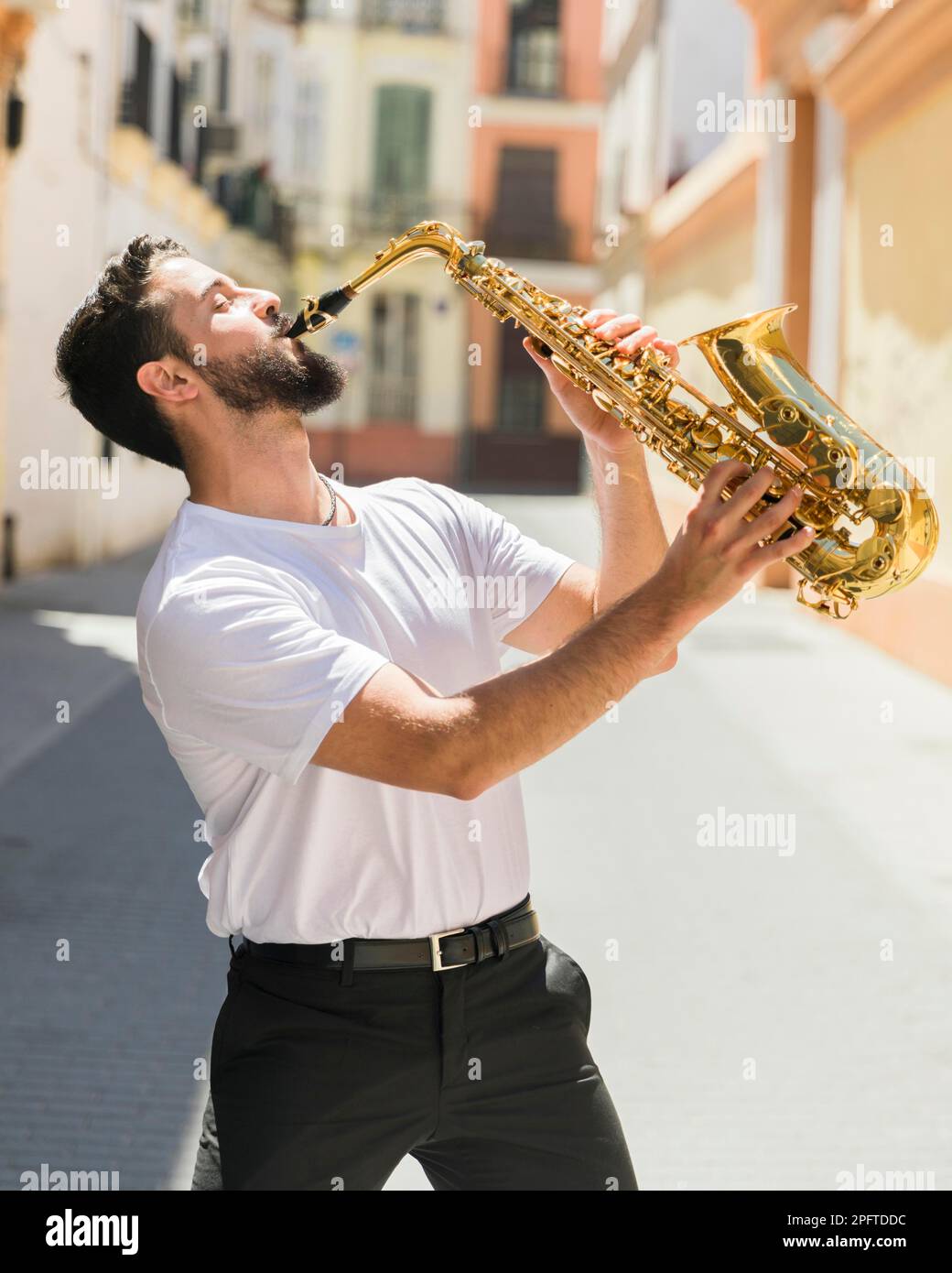 passionated musician performing street Stock Photo - Alamy