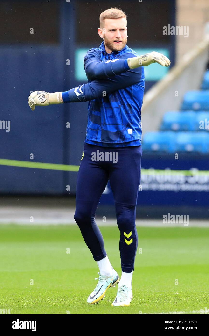 London, UK. 18th Mar, 2023. George Long of Millwall warming up prior to ...