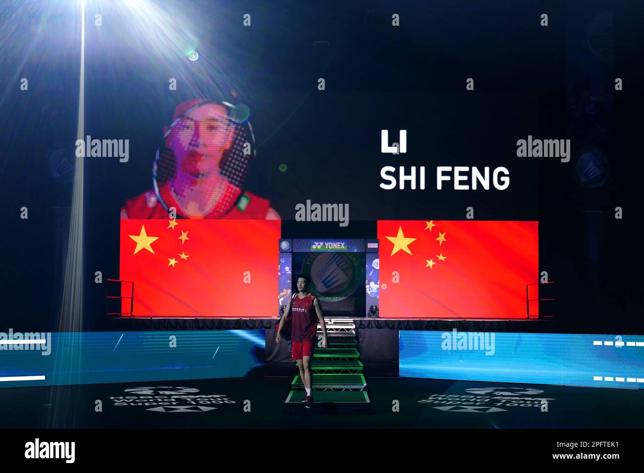 China's Li Shi Feng walks out to play Denmark's Anders Antonsen during ...