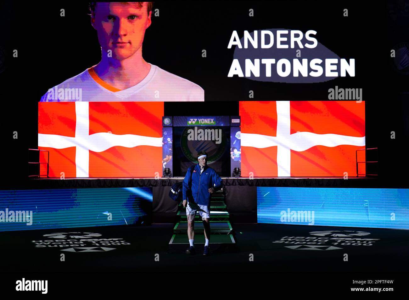 Denmark's Anders Antonsen walks out to play China's Li Shi Feng during ...