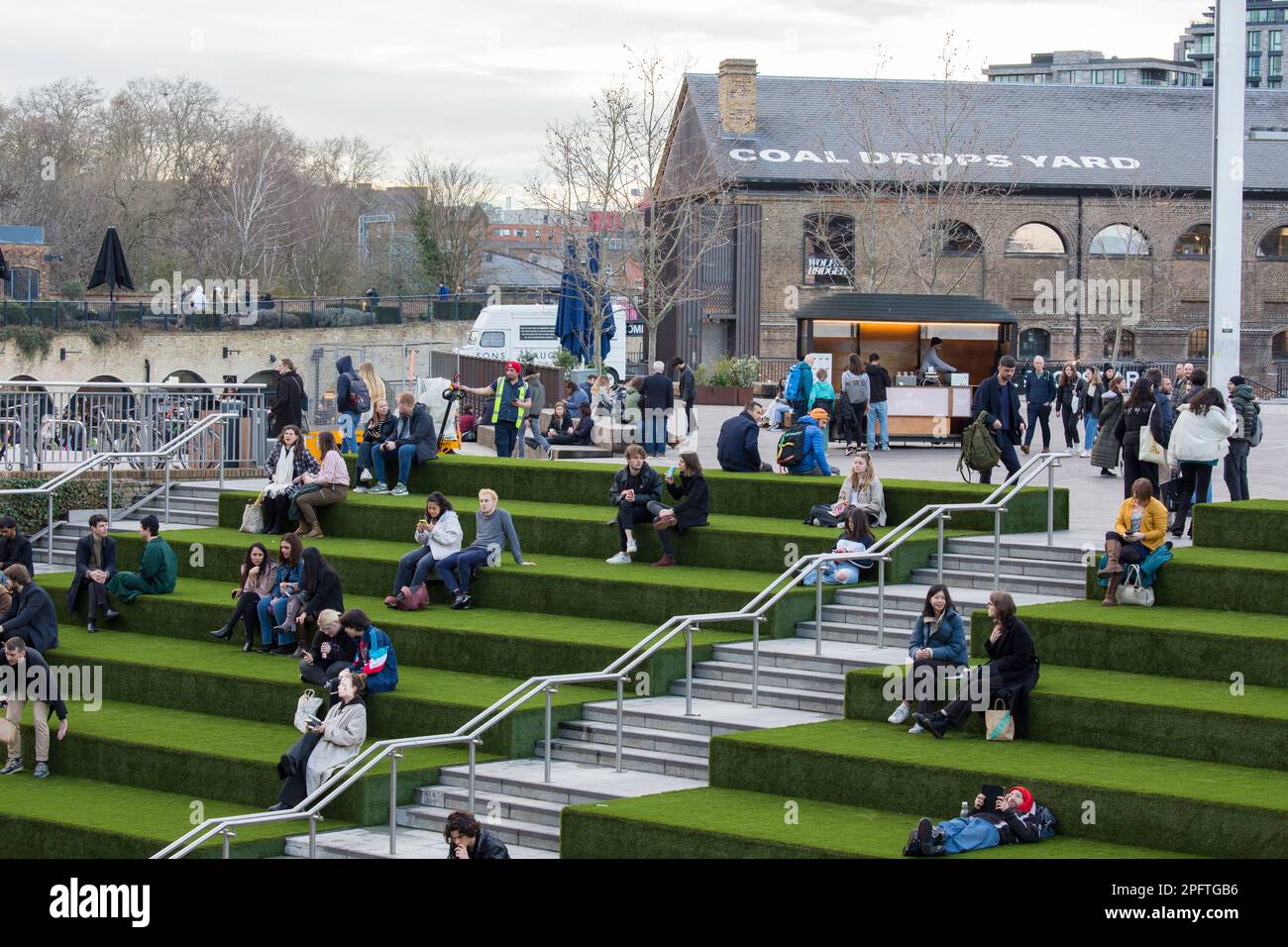 Grass banks by the canal Coal Drops Yard Kings Cross London Stock Photo ...