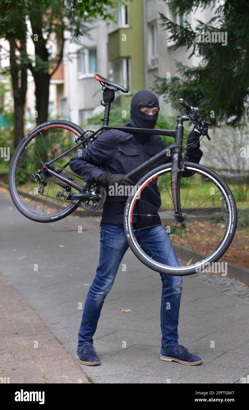 Bicycle thief, symbol photo Stock Photo - Alamy