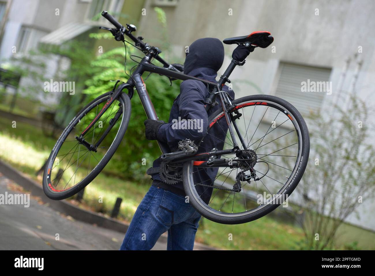 Bicycle thief, symbol photo Stock Photo - Alamy