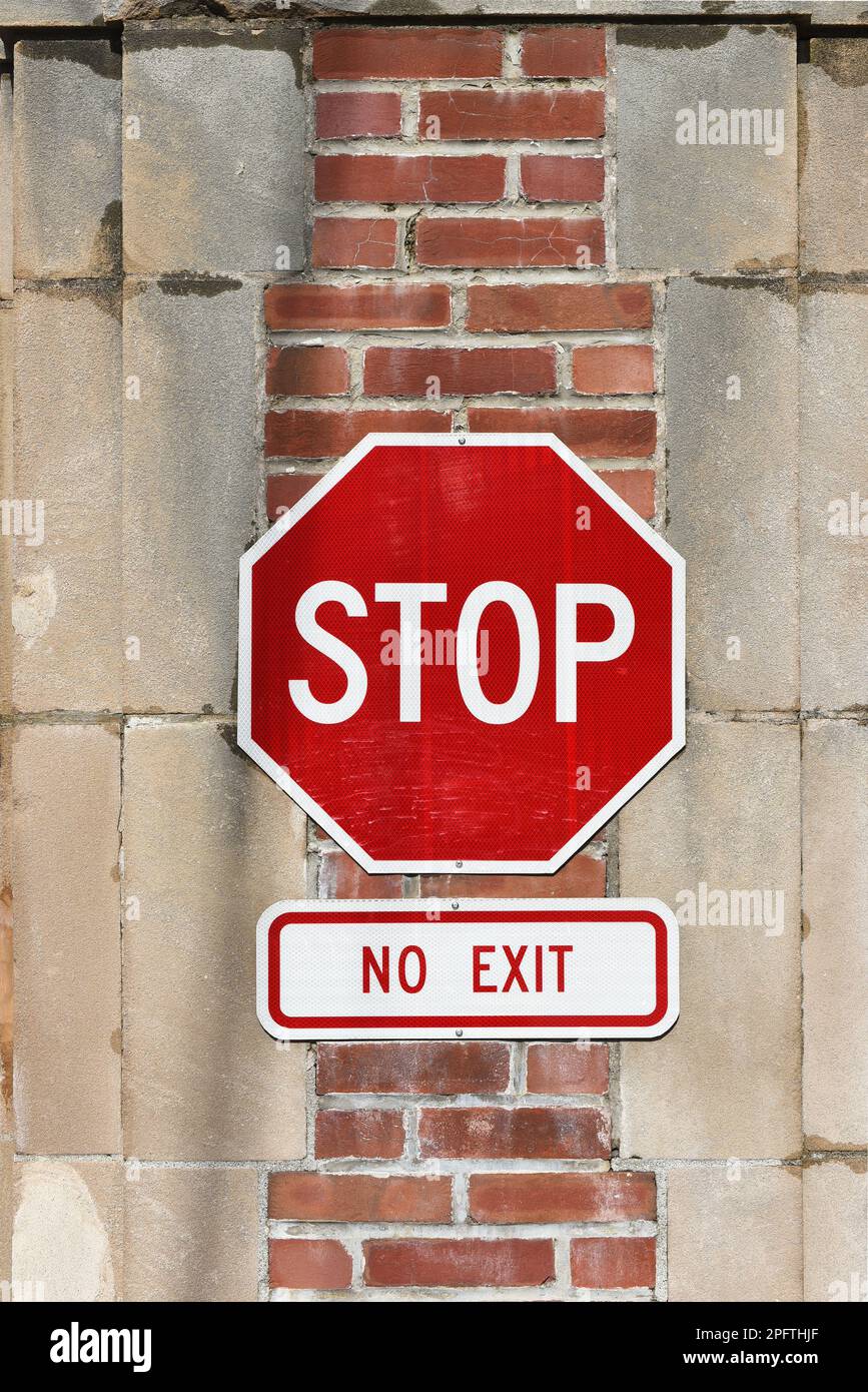 Stop No Exit sign on post of a public parking lot Stock Photo - Alamy