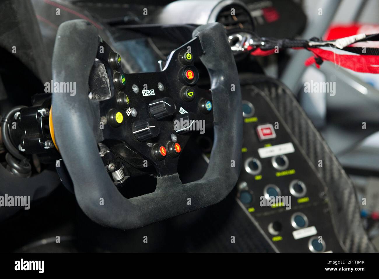 Racing car steering wheel, gearshift panel Stock Photo - Alamy