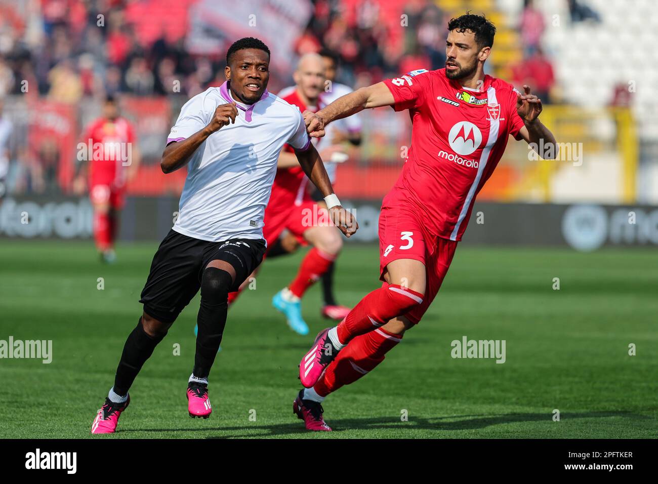Monza, Italy. 18th Mar, 2023. Pablo Mari of AC Monza (R) and David ...