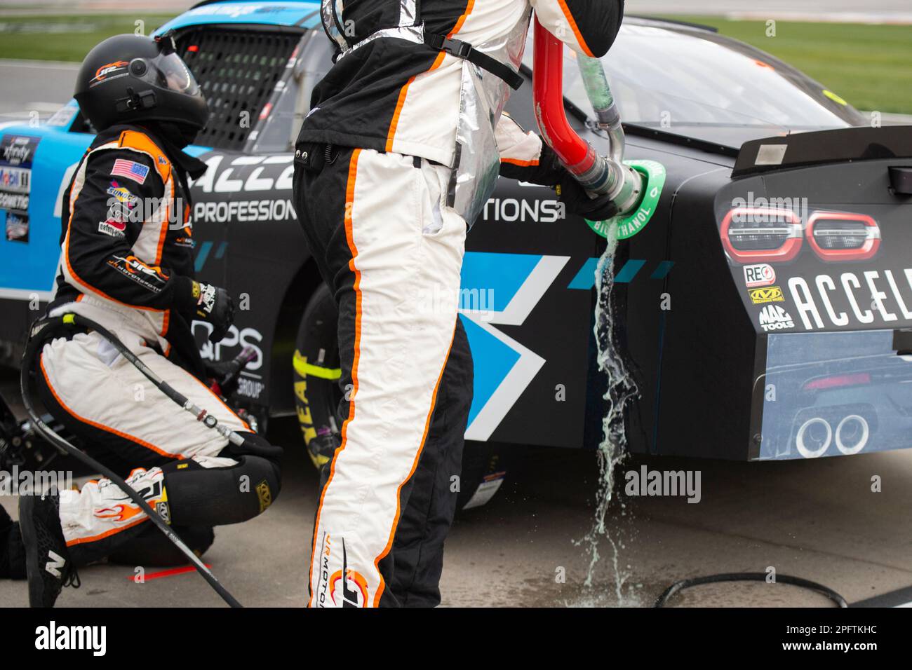 A pit crew works on Sam Mayer's car during a NASCAR Xfinity Series auto ...