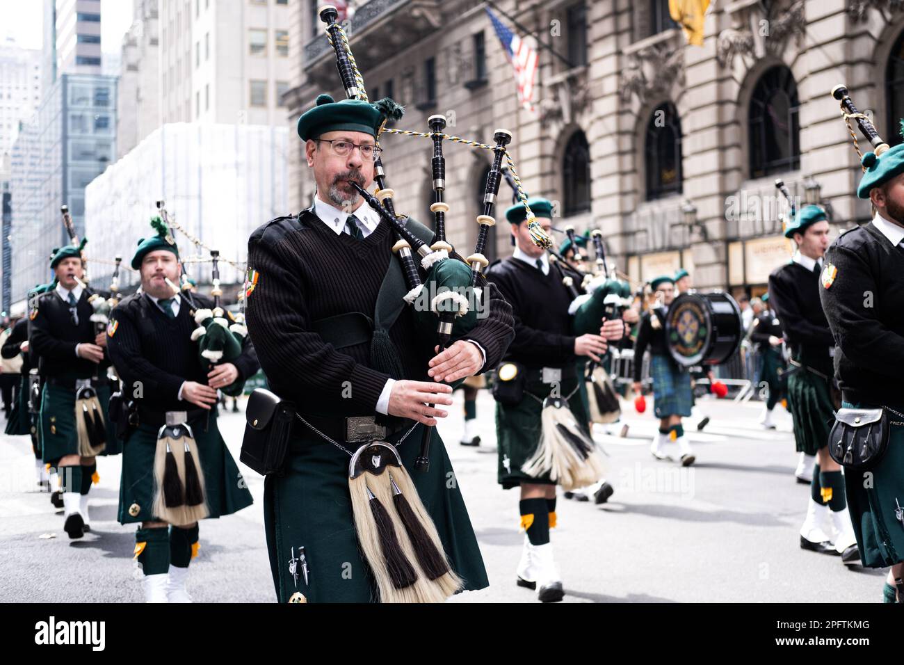 Law enforcement and military members parade during the Saint Patrick's ...