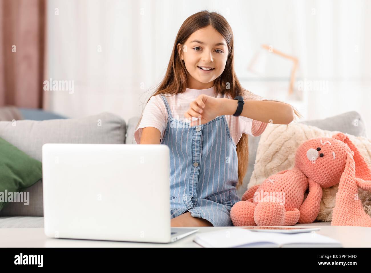 Little girl time wrist watch hi-res stock photography and images - Alamy