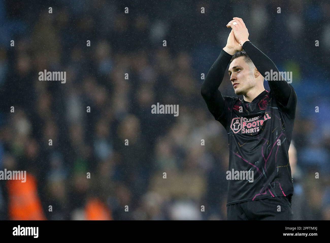 Manchester, UK. 18th Mar, 2023. Connor Roberts of Burnley shows his ...