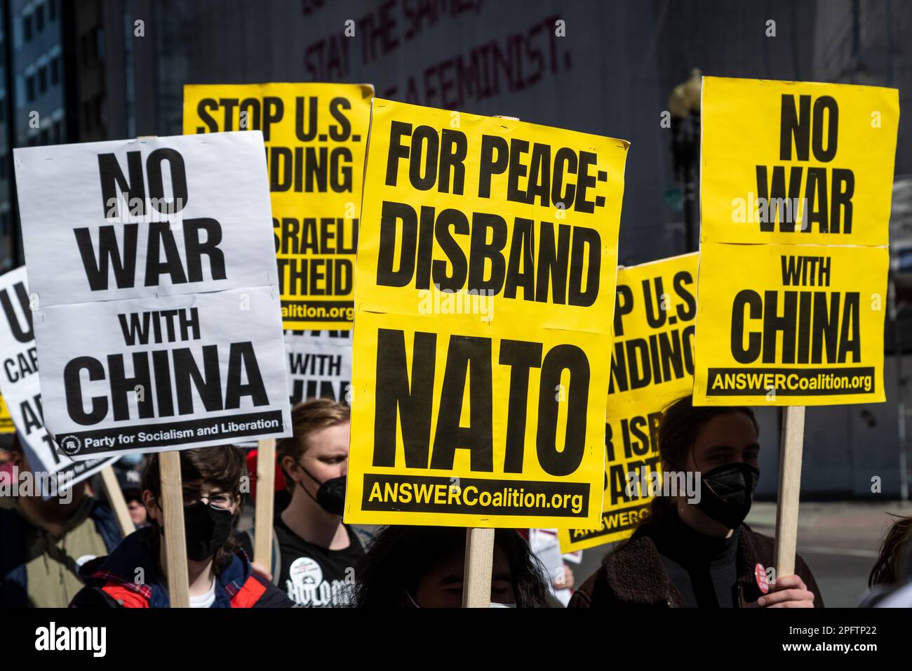 Anti-war protesters march through Washington, DC on March 18, 2023 ...