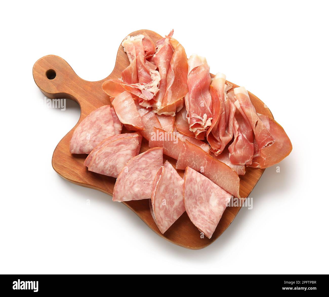 Wooden board with assortment of tasty deli meats isolated on white ...