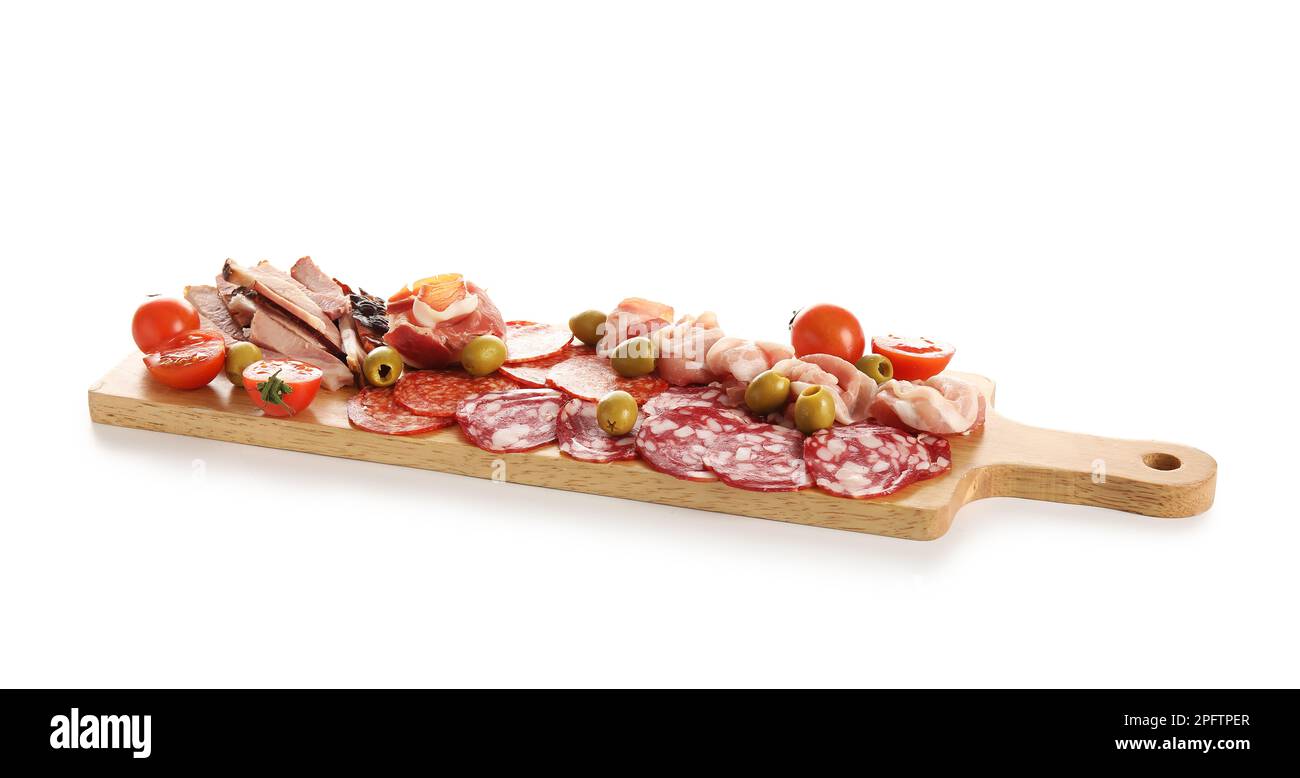 Wooden board with assortment of tasty deli meats isolated on white ...