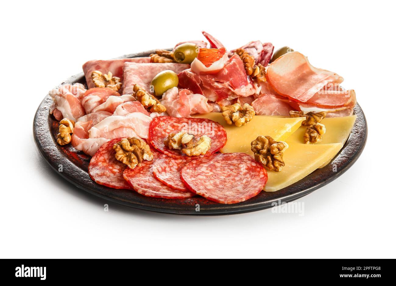 Plate with assortment of tasty deli meats and cheese isolated on white ...