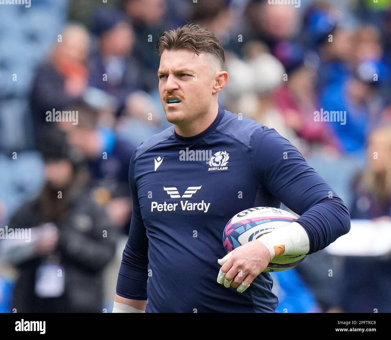 Jack Dempsey #8 of Scotland warms up before the 2023 Guinness 6 Nations ...