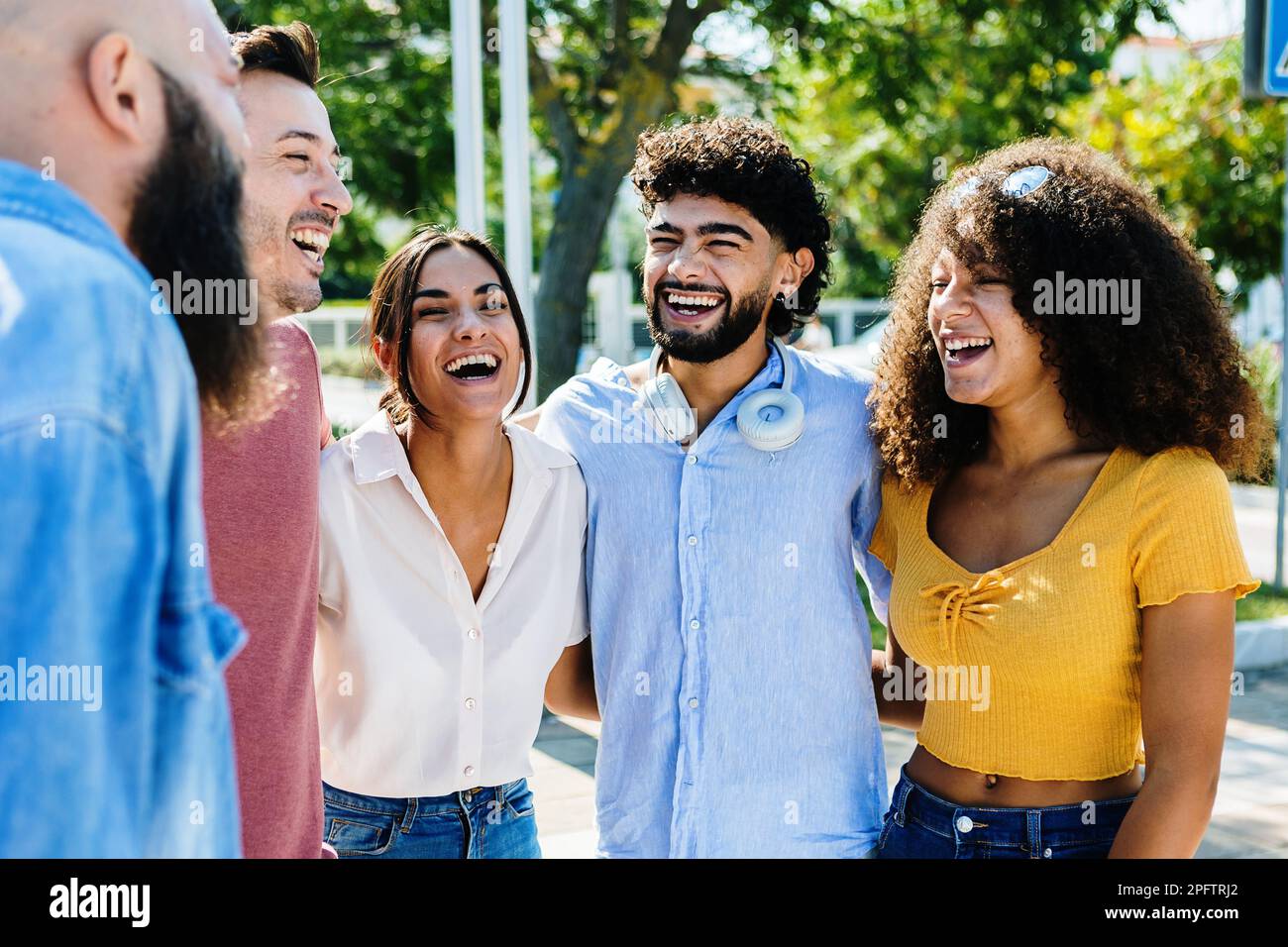 Multiracial group of happy young student friends having fun together ...
