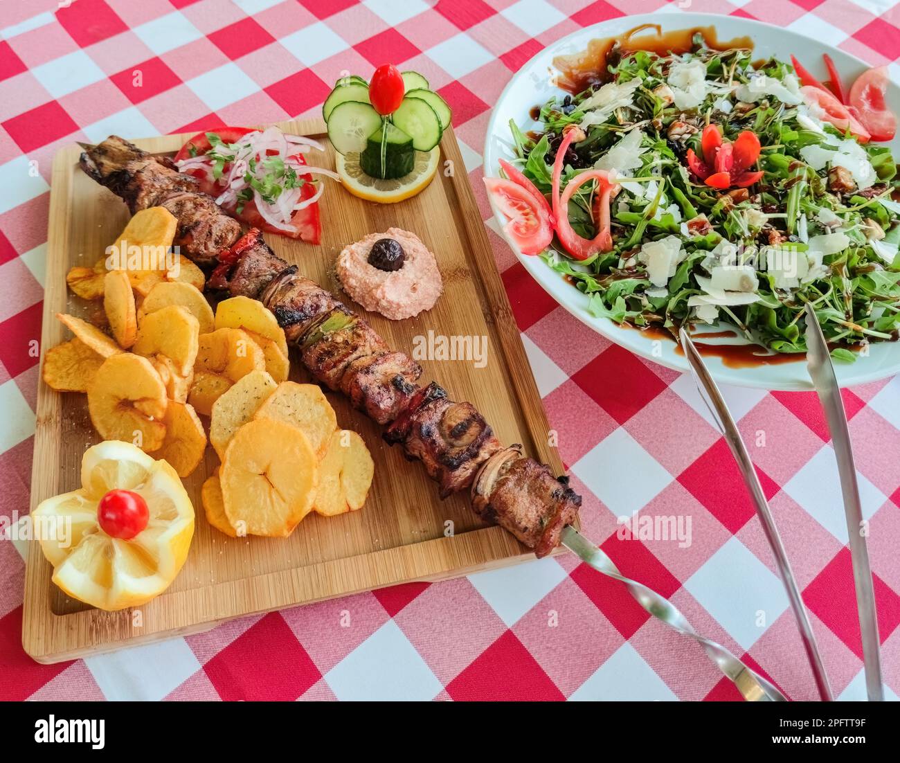 Greek kontosouvli large souvlaki made by fresh meat grilled on fire and ...