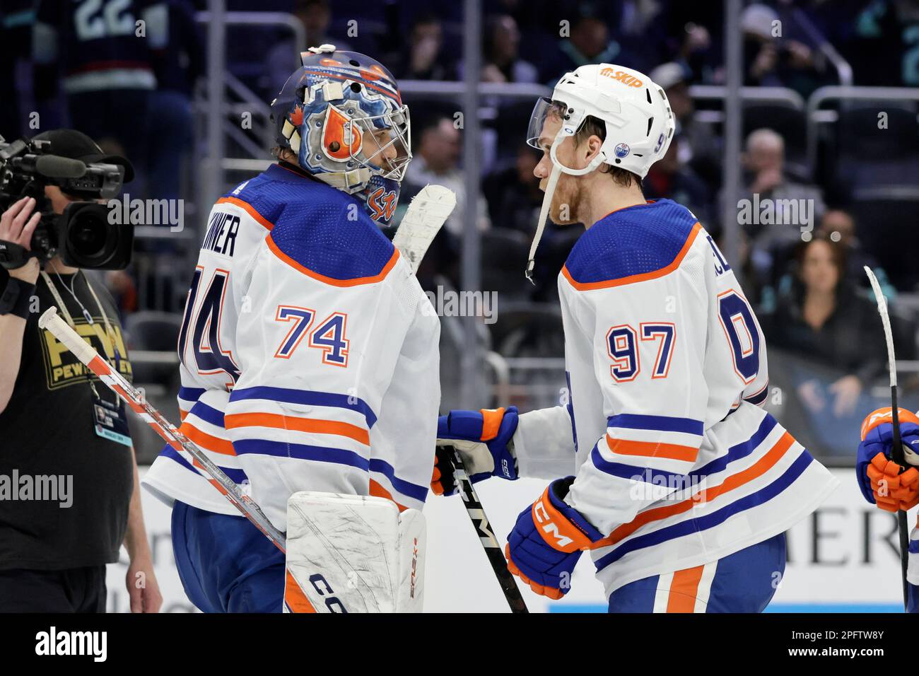 Edmonton Oilers center Connor McDavid (97) celebrates with goaltender ...
