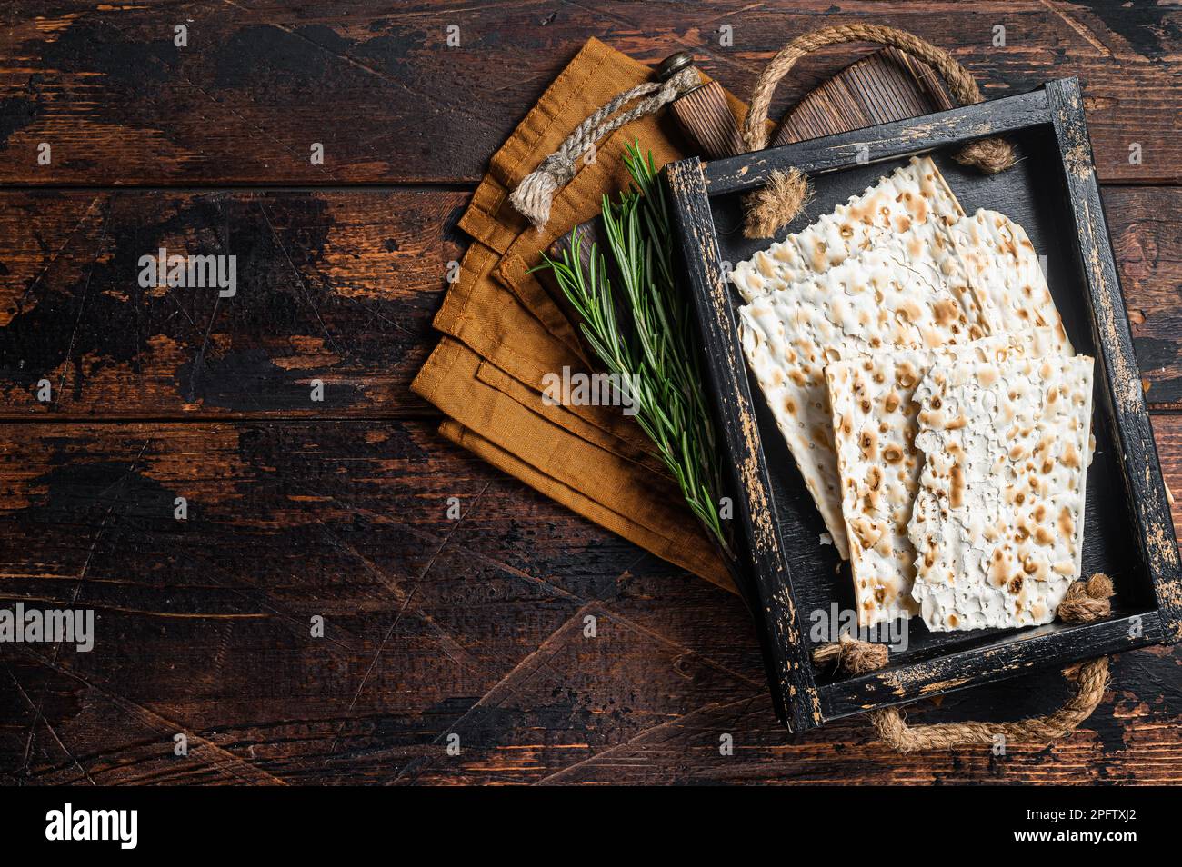 Passover matzos of celebration with matzo unleavened bread in a wooden ...