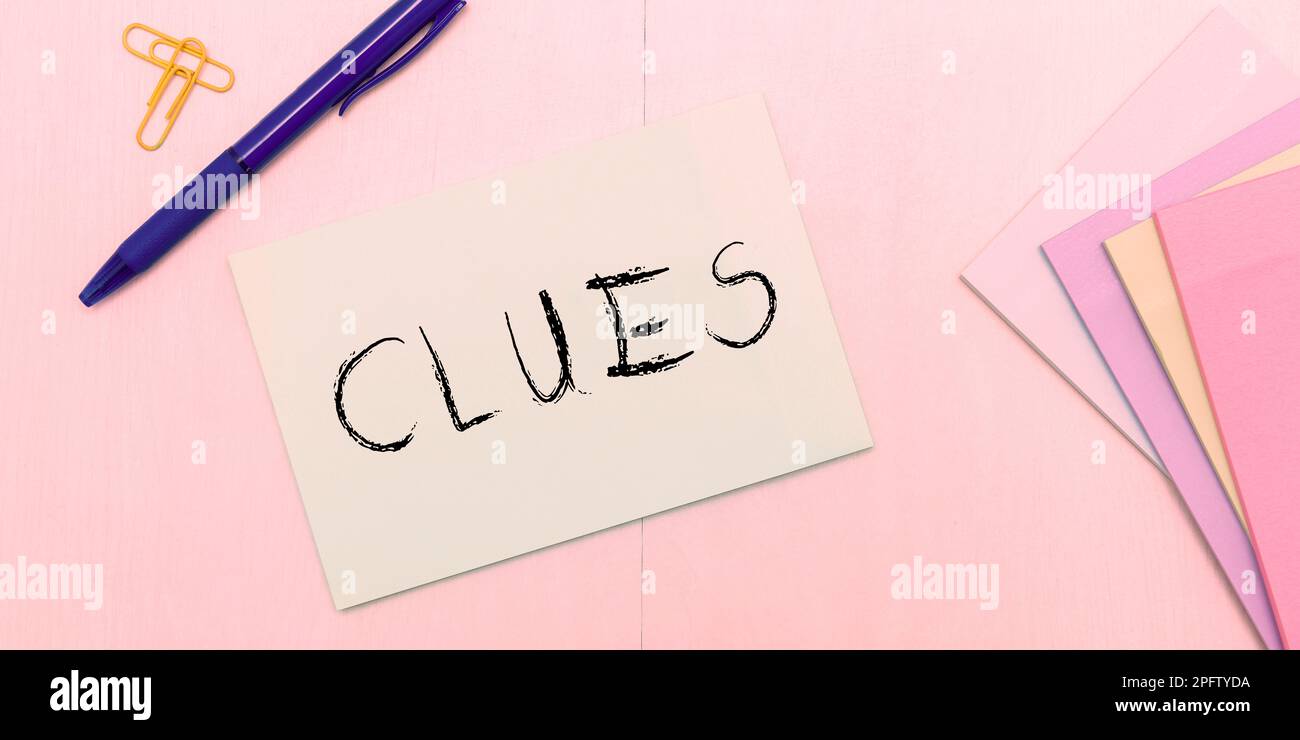 Handwriting text Clues. Word Written on Piece of evidence information ...