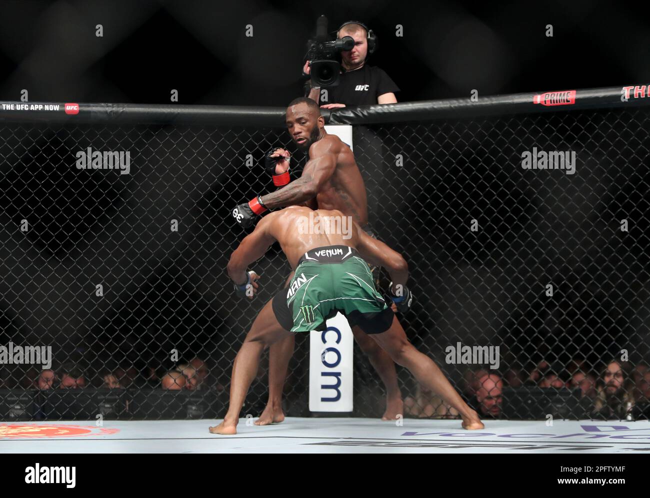 Leon Edwards (right) in action against Kamaru Usman during their ...