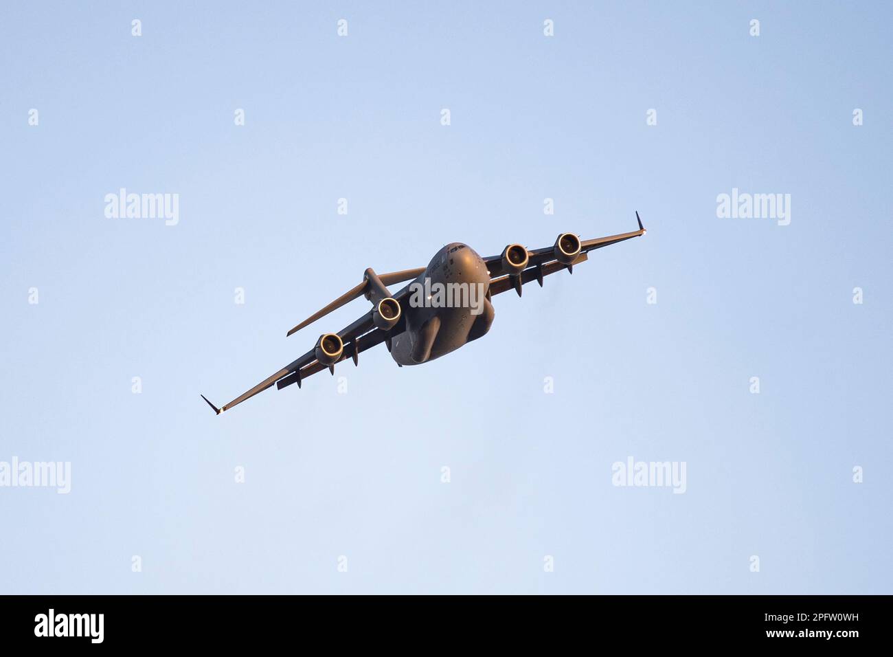 A military aircraft performs a flyover during opening ceremonies for ...