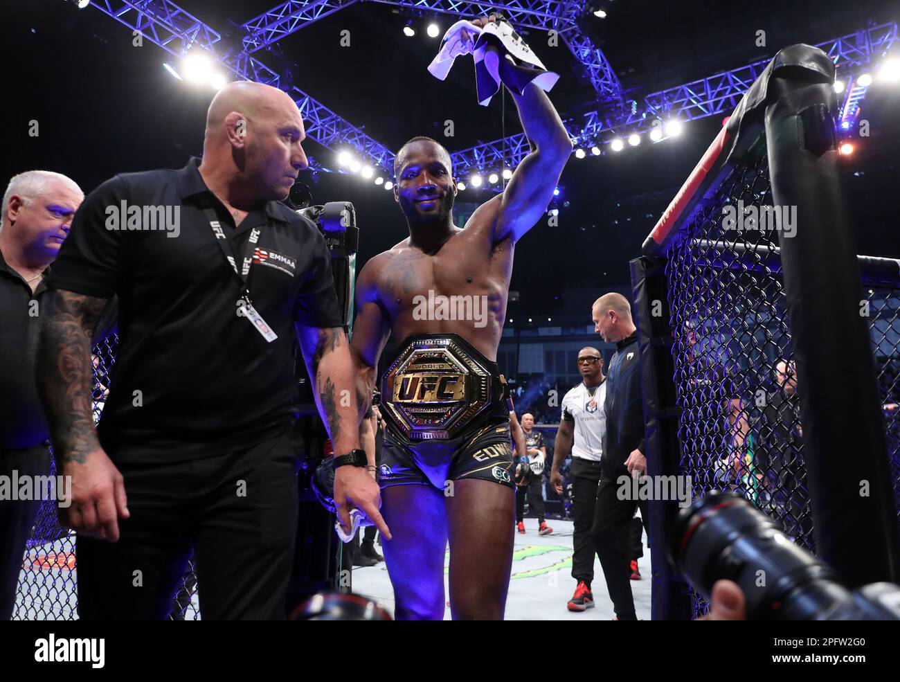 Leon Edwards leaves the Octagon after victory against Kamaru Usman ...