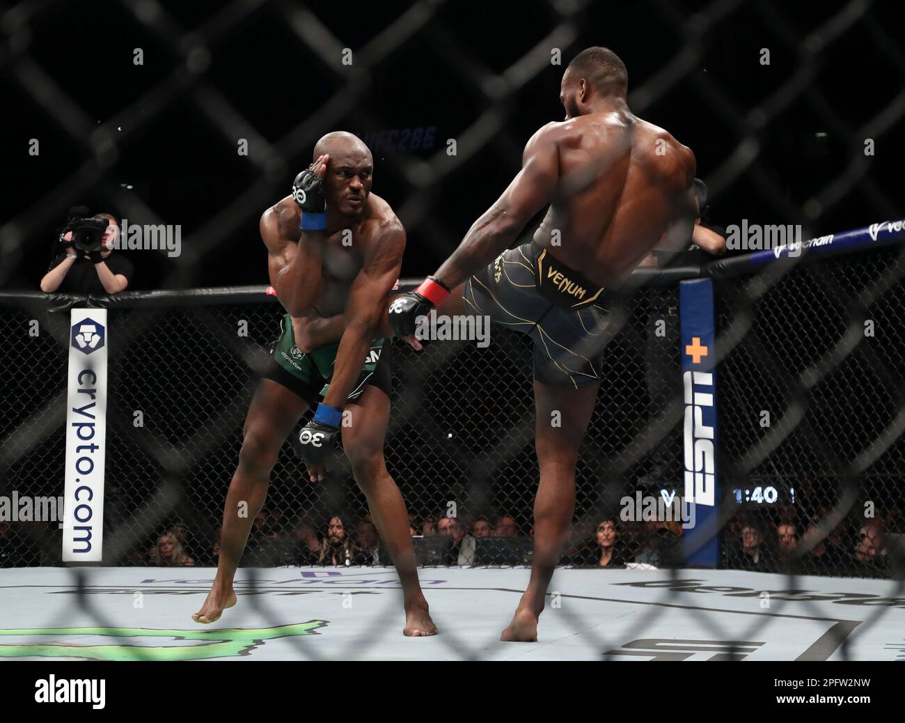 Kamaru Usman (left) in action against Leon Edwards during their ...