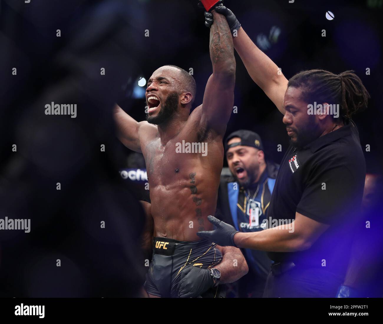 Leon Edwards celebrates victory after the welterweight title bout ...