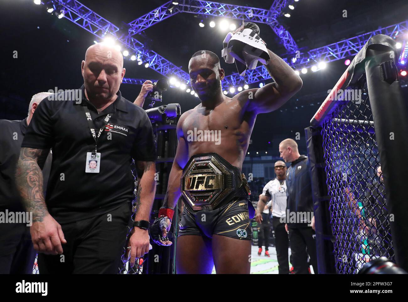 Leon Edwards leaves the Octagon after victory against Kamaru Usman ...