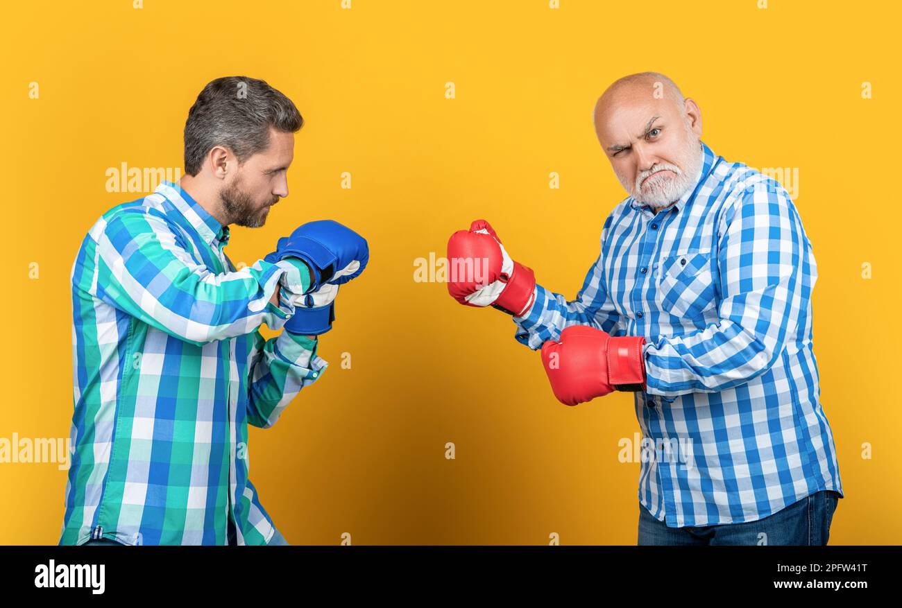 aggressive generation men fighting on background. photo of generation ...